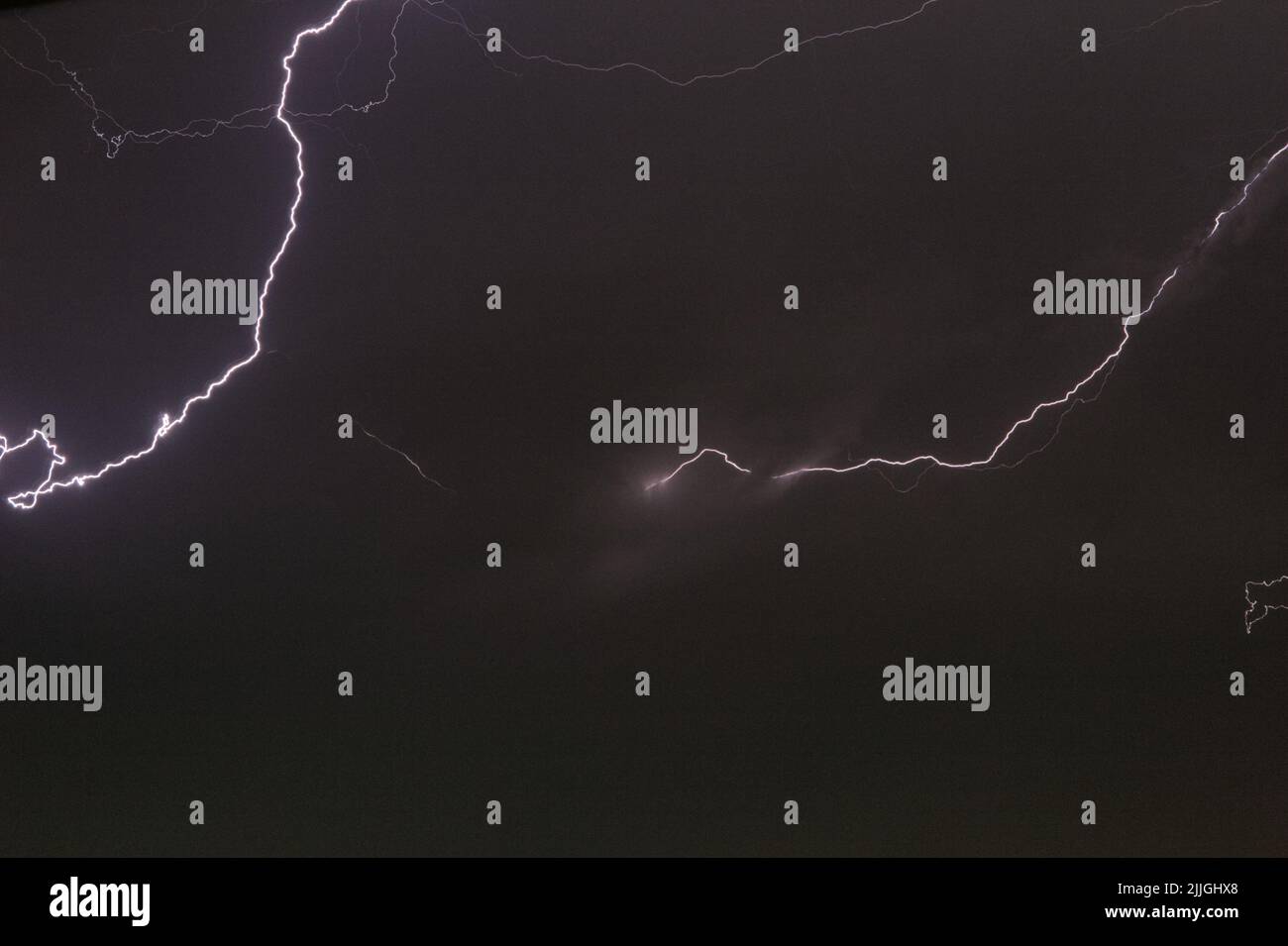 Before the Storm - Thunderbolt at Night Stock Photo - Alamy