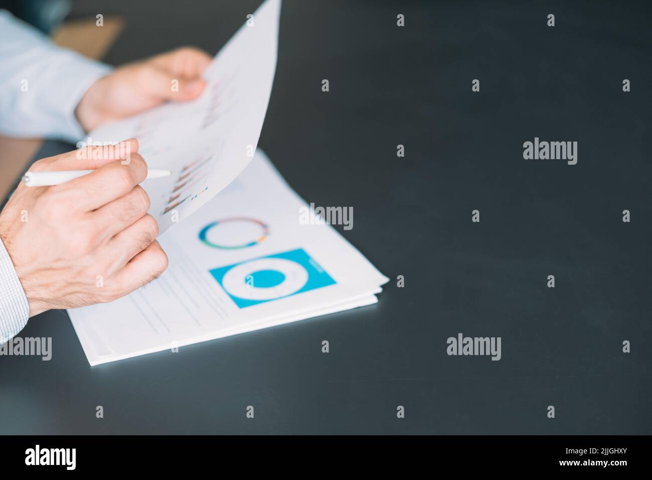 business analytics man working graphs charts Stock Photo - Alamy