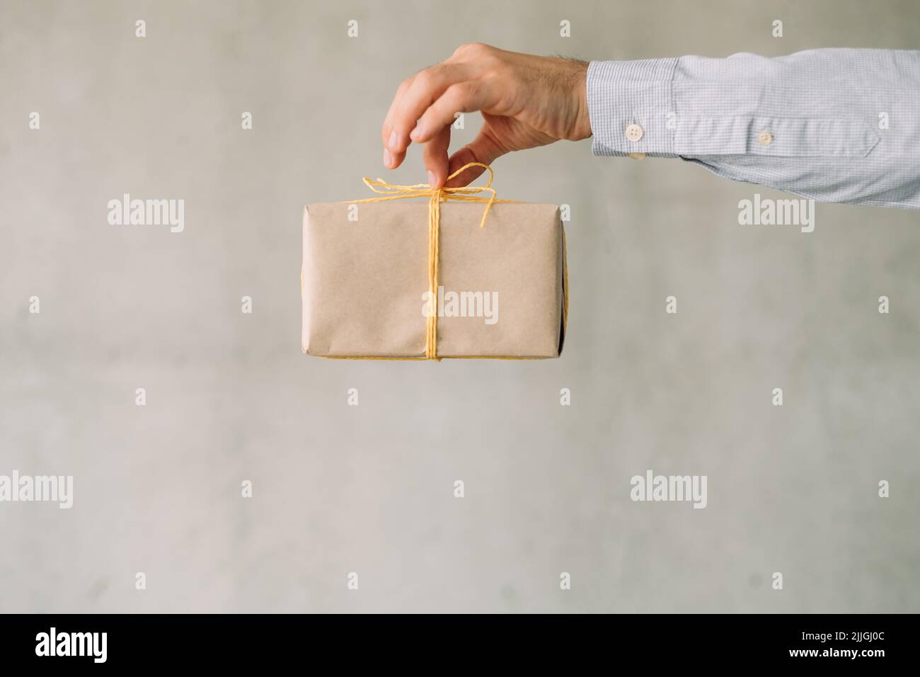 office food delivery service man wrapped box Stock Photo - Alamy