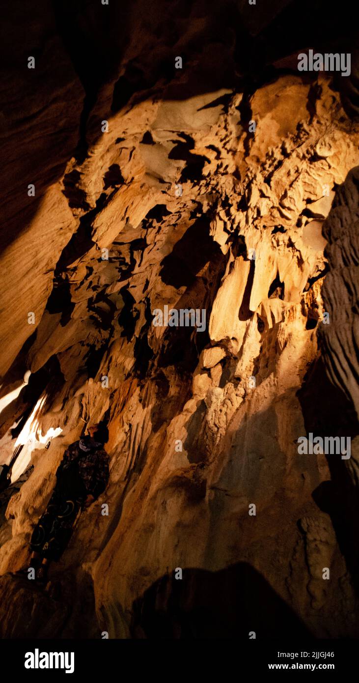 A vertical shot of beautiful rocky surfaces in a cave Stock Photo - Alamy