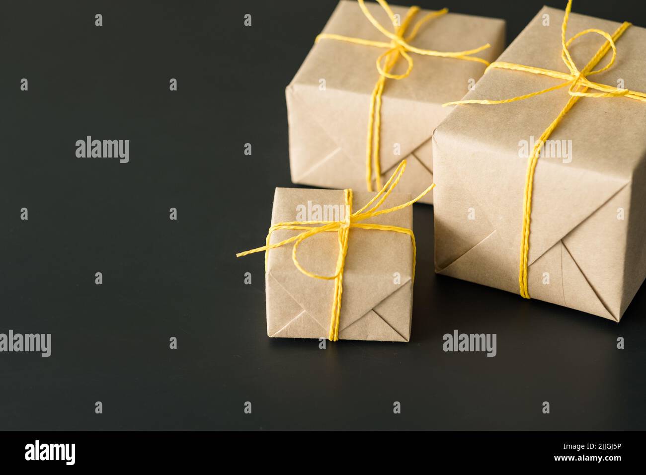 online shopping delivery service wrapped boxes Stock Photo - Alamy