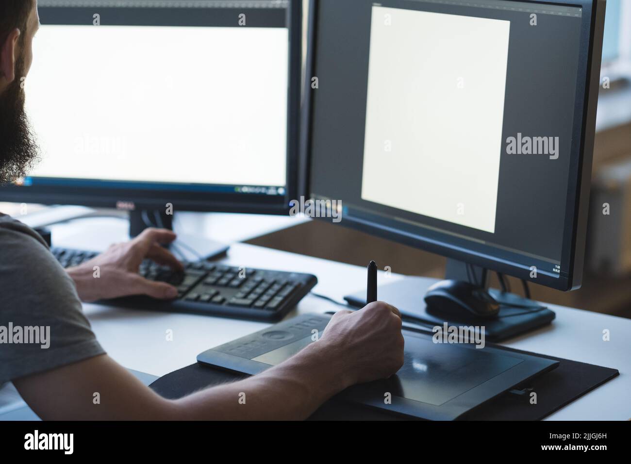 web graphic design male artist digital tablet Stock Photo - Alamy