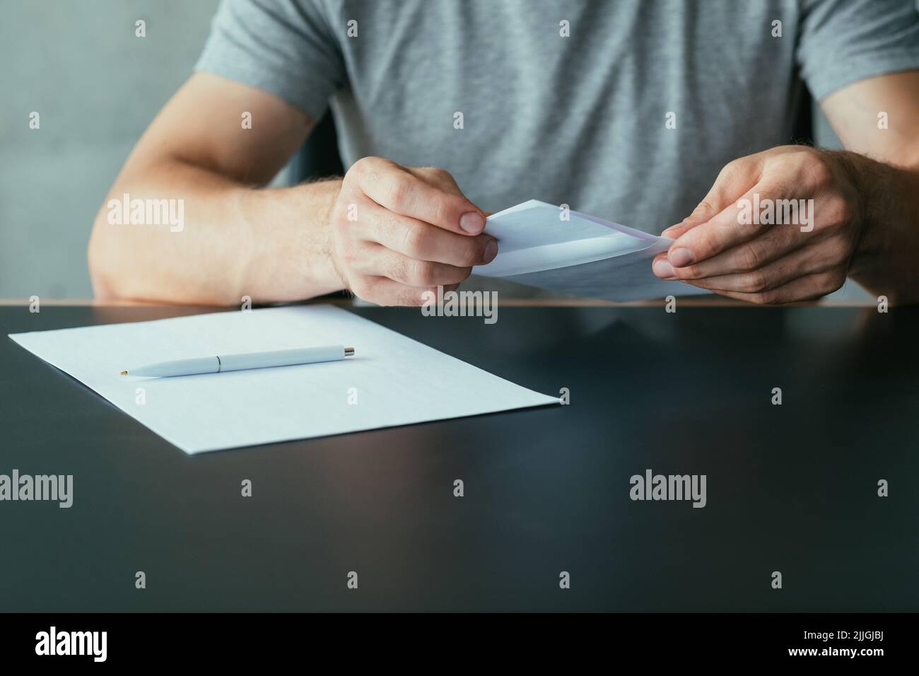 application form man business letter envelope Stock Photo - Alamy