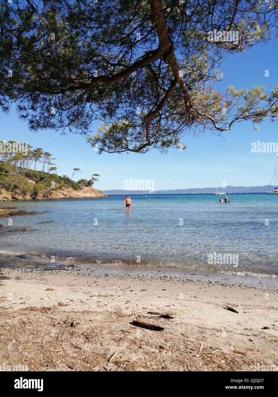 Sunbathing on Notre-Dame beach on Porquerolles island, France Stock ...