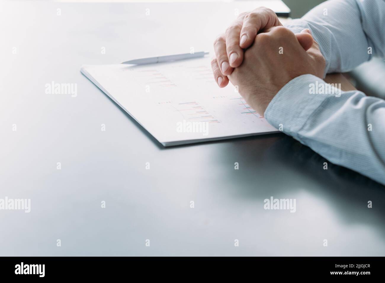corporate meeting project manager desk graphs Stock Photo - Alamy
