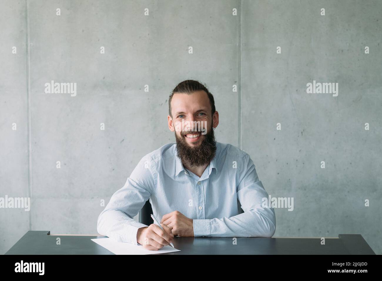 human resources cheerful hr manager pen notes Stock Photo - Alamy