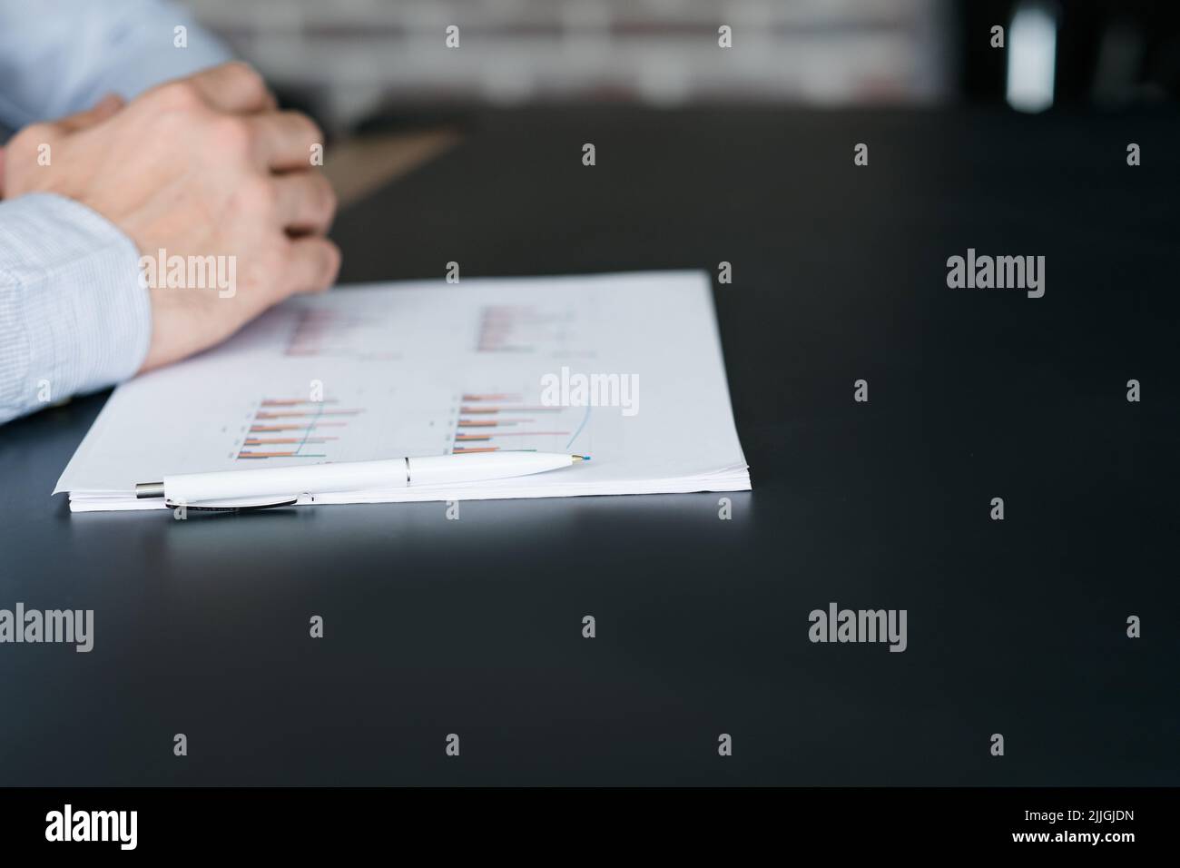 corporate meeting project manager desk graphs Stock Photo - Alamy