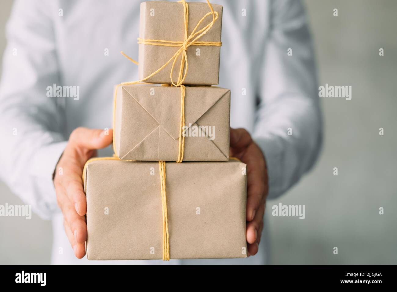 office snacks delivery service beige gift boxes Stock Photo - Alamy