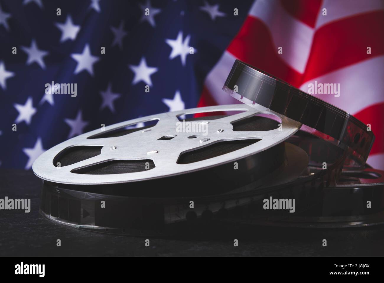 American cinema. Cinematography in the USA. Old film reel on the ...