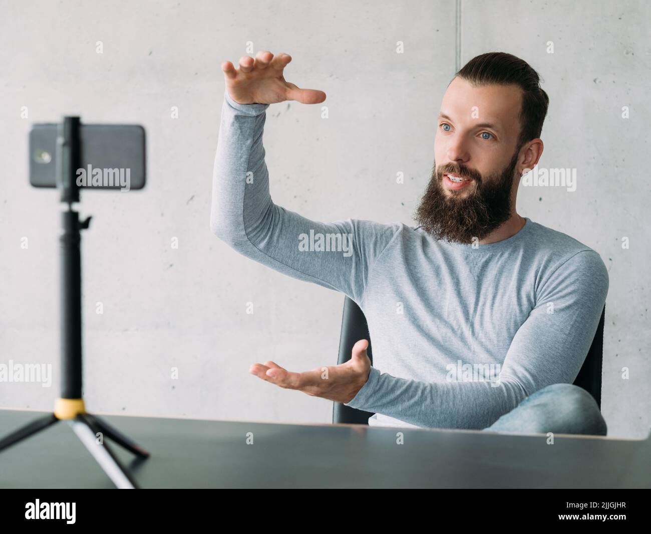 goods promotion guy smartphone advertisement Stock Photo - Alamy