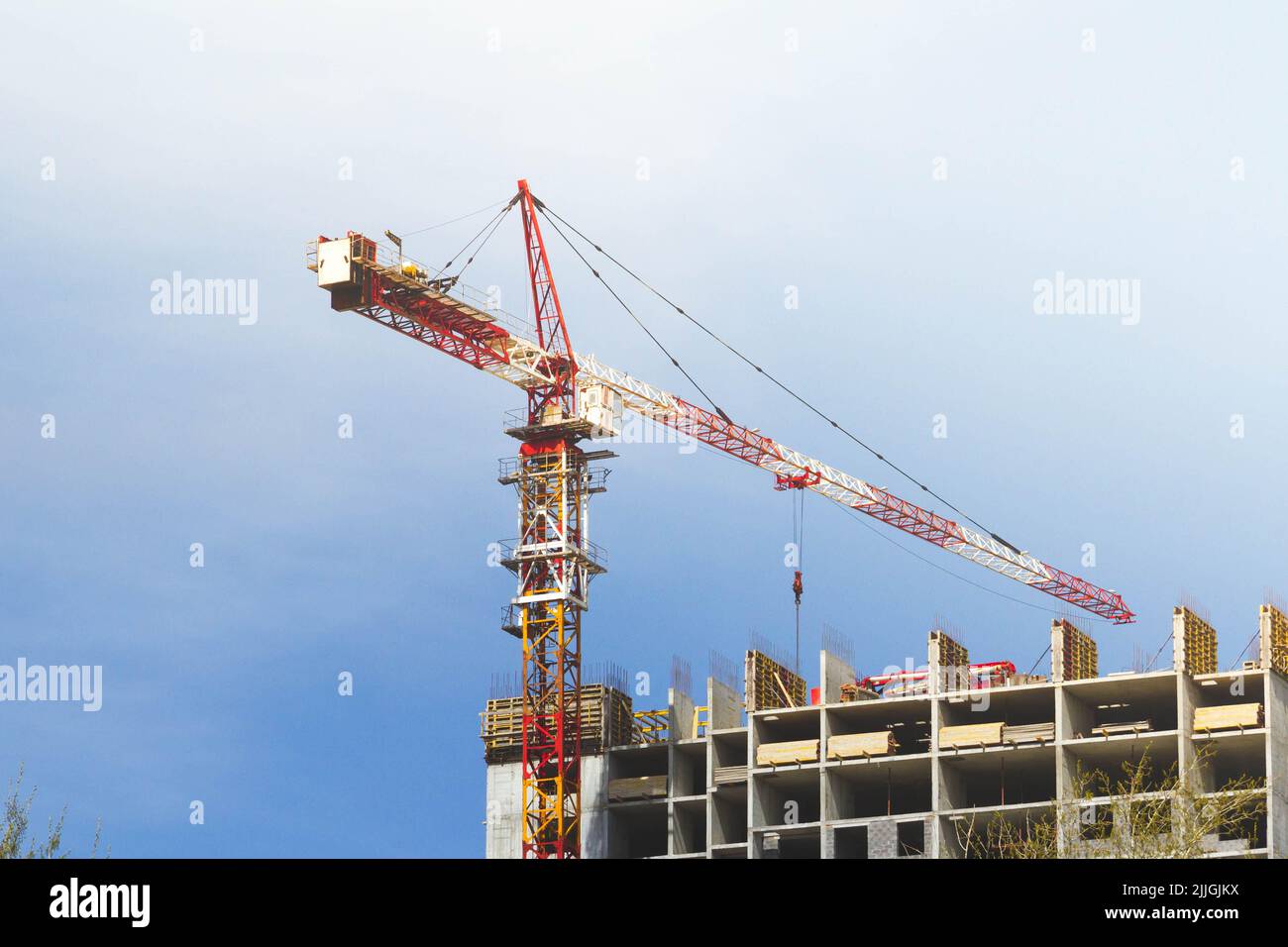 Lifting crane. Construction of high structures. Rise to height ...
