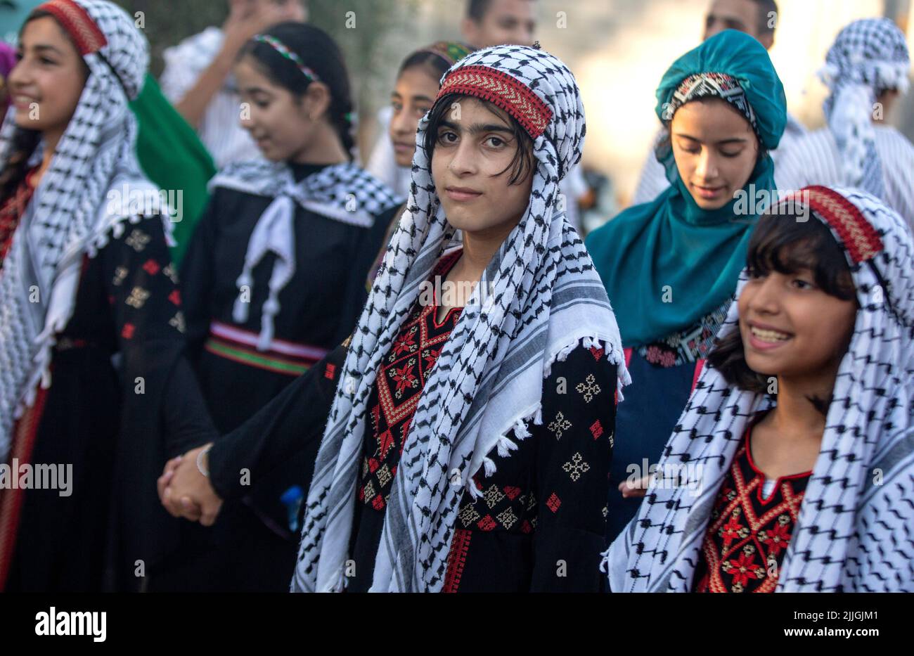 Palestinian children seen wearing traditional costumes during the ...