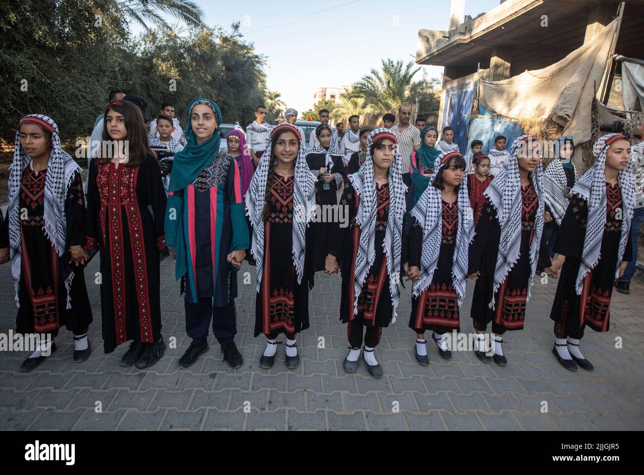 Palestinian children seen wearing traditional costumes during the ...