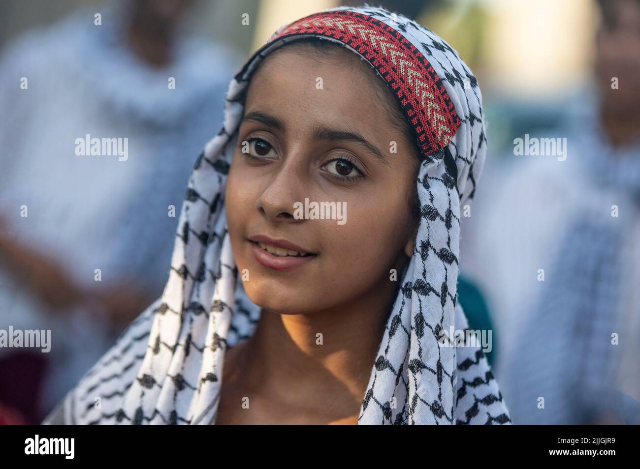 A Palestinian girl seen wearing traditional dress, during a celebration ...