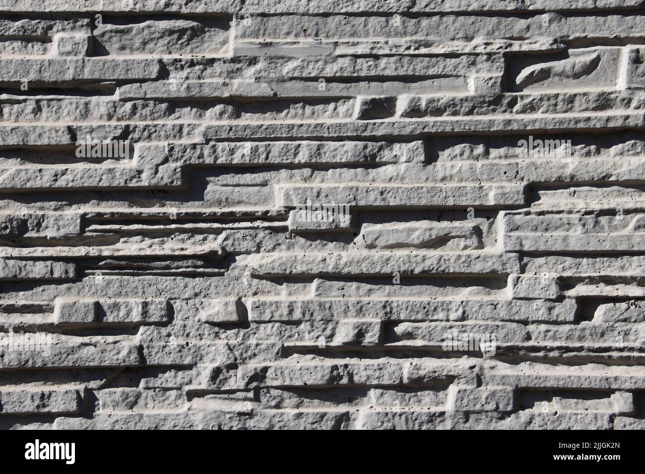 White narrow stone wall background texture Stock Photo - Alamy