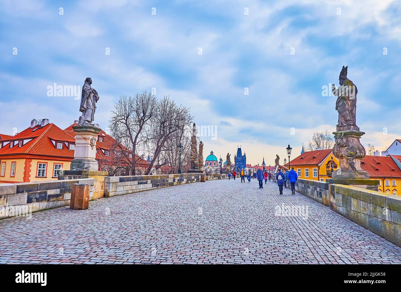 The medieval pedestrian Charles Bridge with masterpiece statues of ...