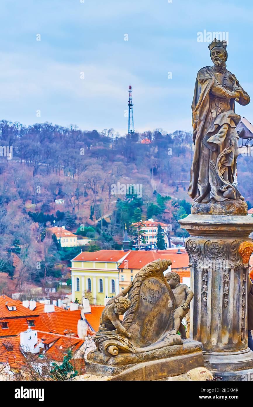 The carved stone statues of angels and St Philip Neri, located at the ...