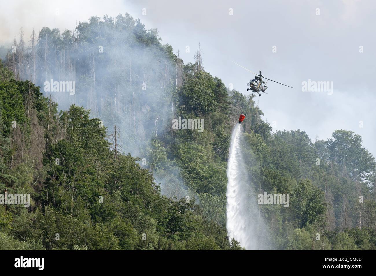 Firefighting helicopter flies over hi-res stock photography and images ...