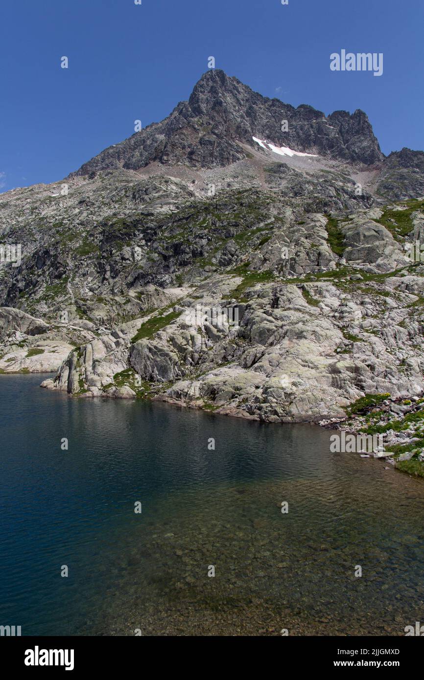 A vertical shot of the beautiful Pyrenees mountain range on the border ...