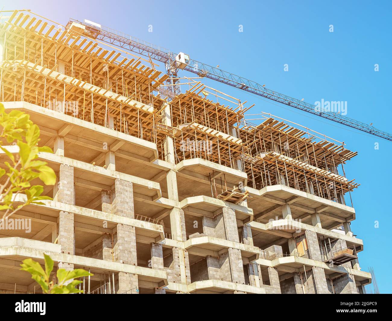Bottom view of a multi-storey monolithic building under construction ...
