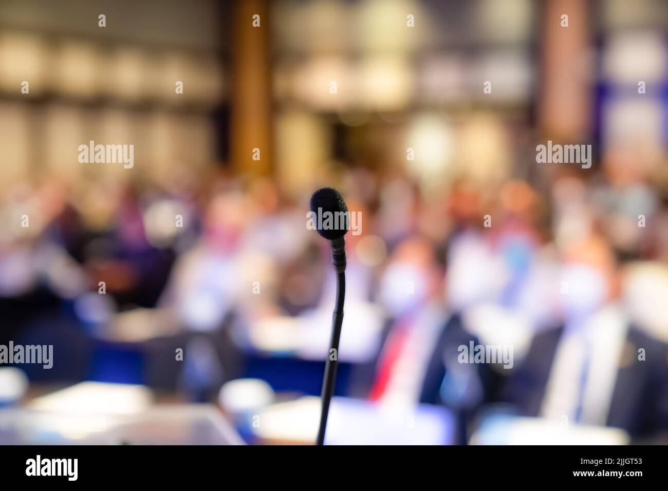Small microphone behind the podium for the MC, master of ceremony, with ...