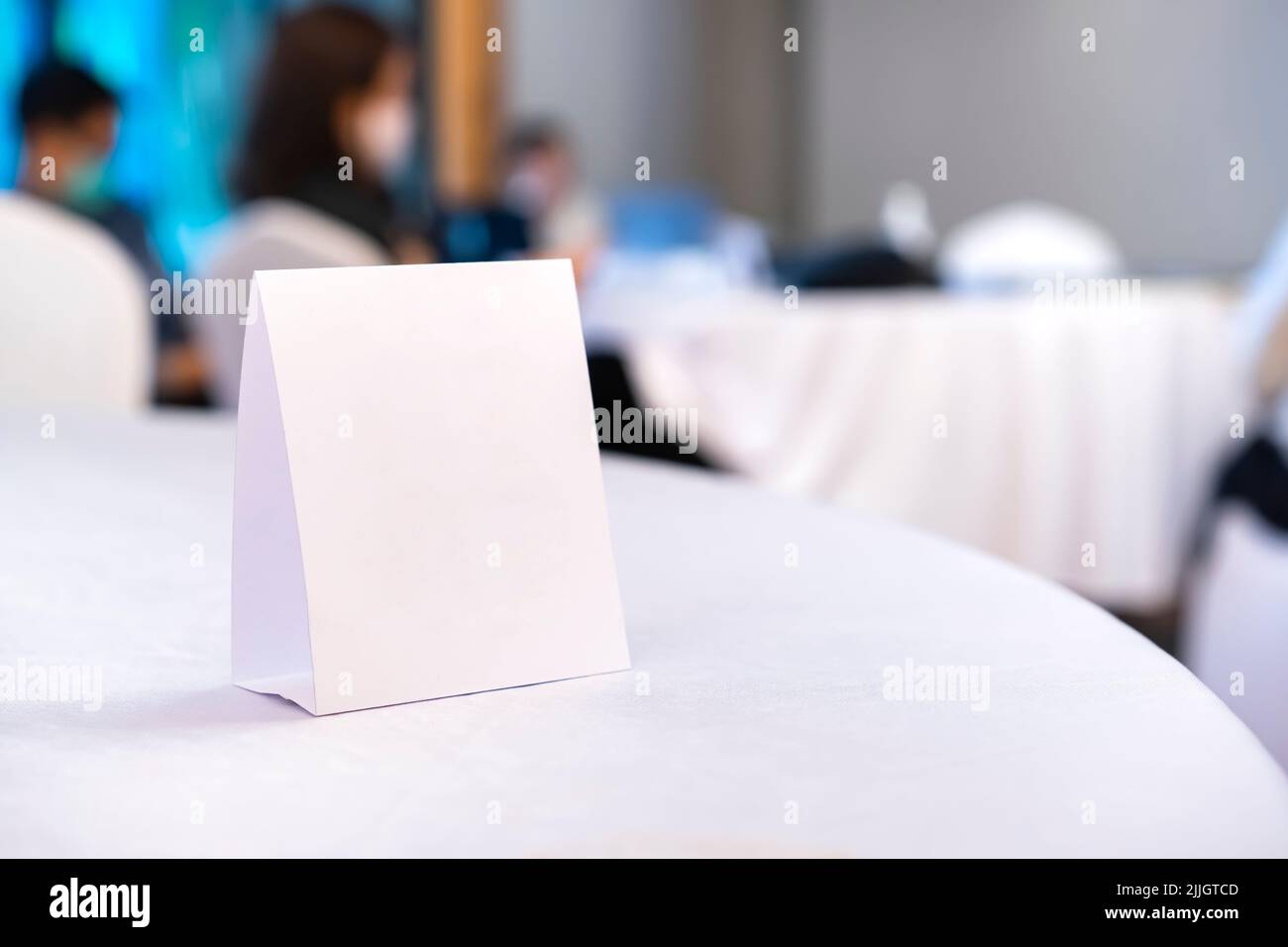 Triangular shaped table sign is placed on the table for scanning QR ...