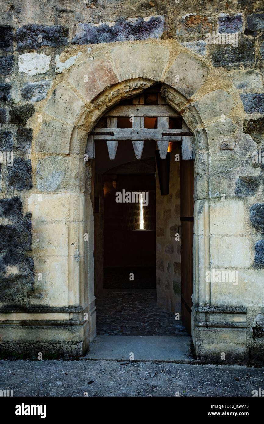 Big stone gates of Blandy medieval castle with wooden door Stock Photo ...