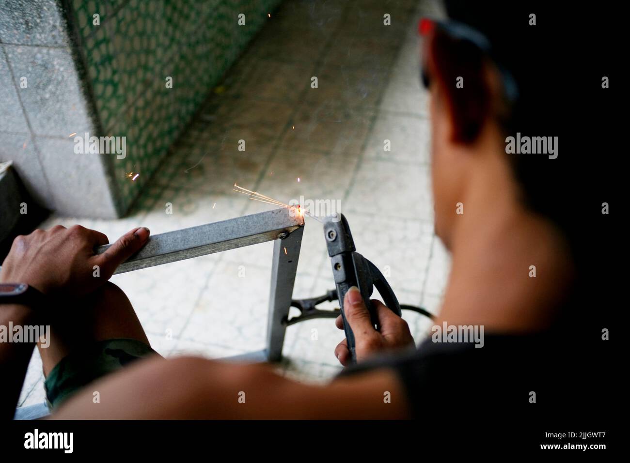 Asian manual worker hi-res stock photography and images - Alamy