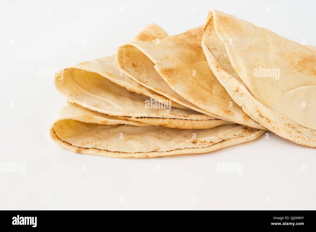 Tortilla, cakes made of wheat flour on a white background Stock Photo ...