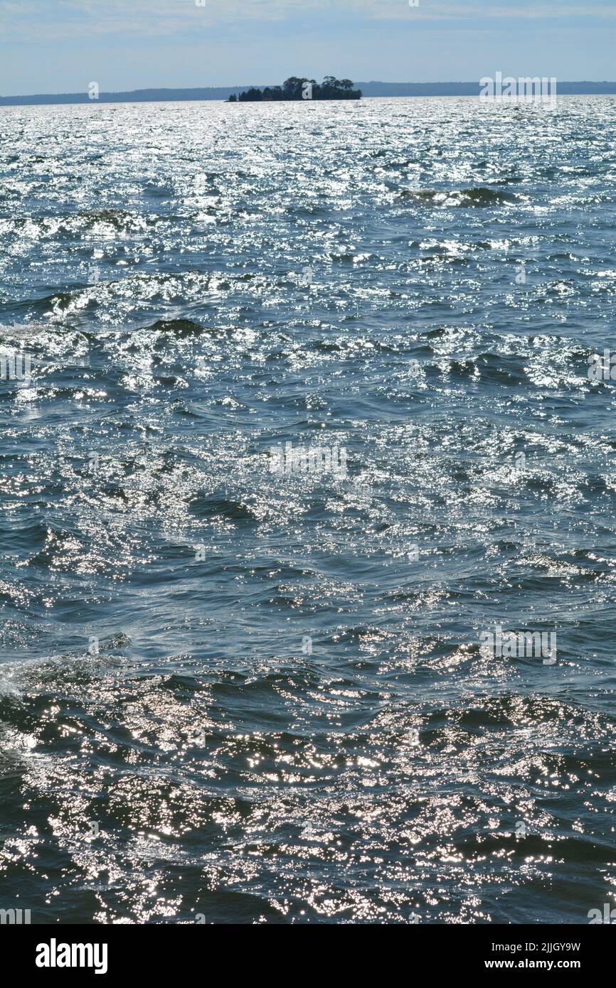 storm on lake with low summer sun Stock Photo - Alamy