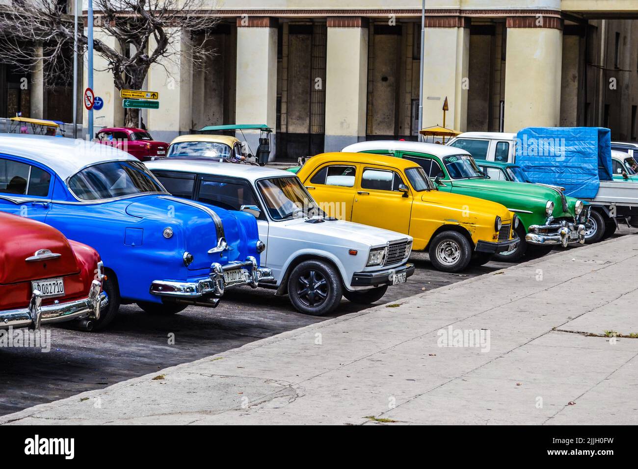 Old vintage cars on the city streets of downtown Havana Cuba Stock ...
