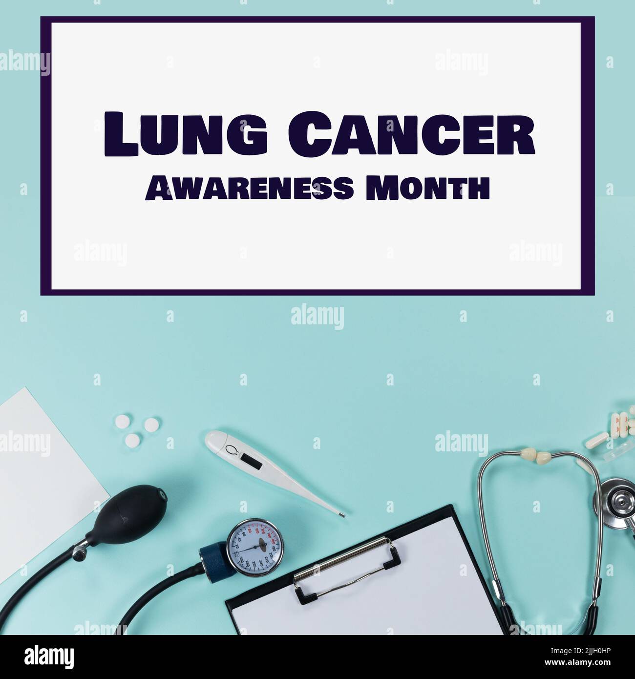 Image of lung cancer awareness month over medical items on blue ...