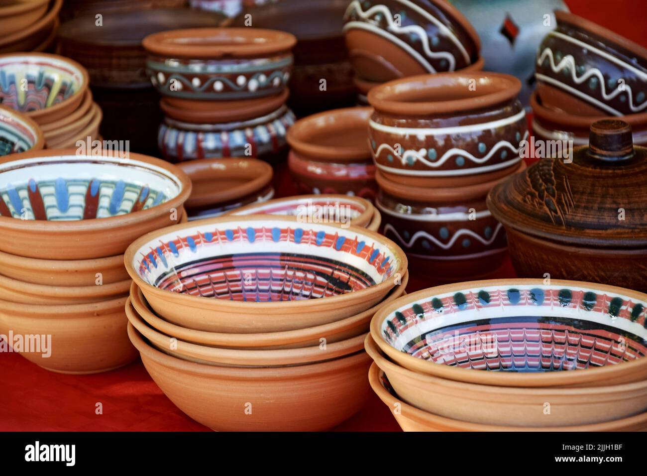 Traditional ceramic bowls and jugs. Showcase of handmade ceramic ...