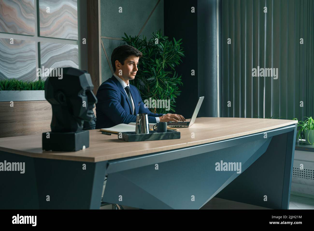 Businessman working with laptop in modern office. General manager,ceo ...