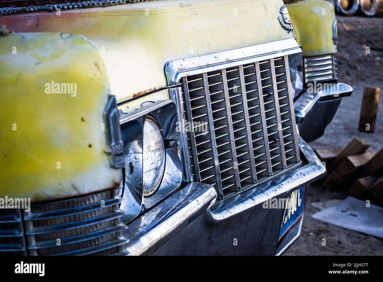 Old fashioned vintage yellow car Stock Photo - Alamy