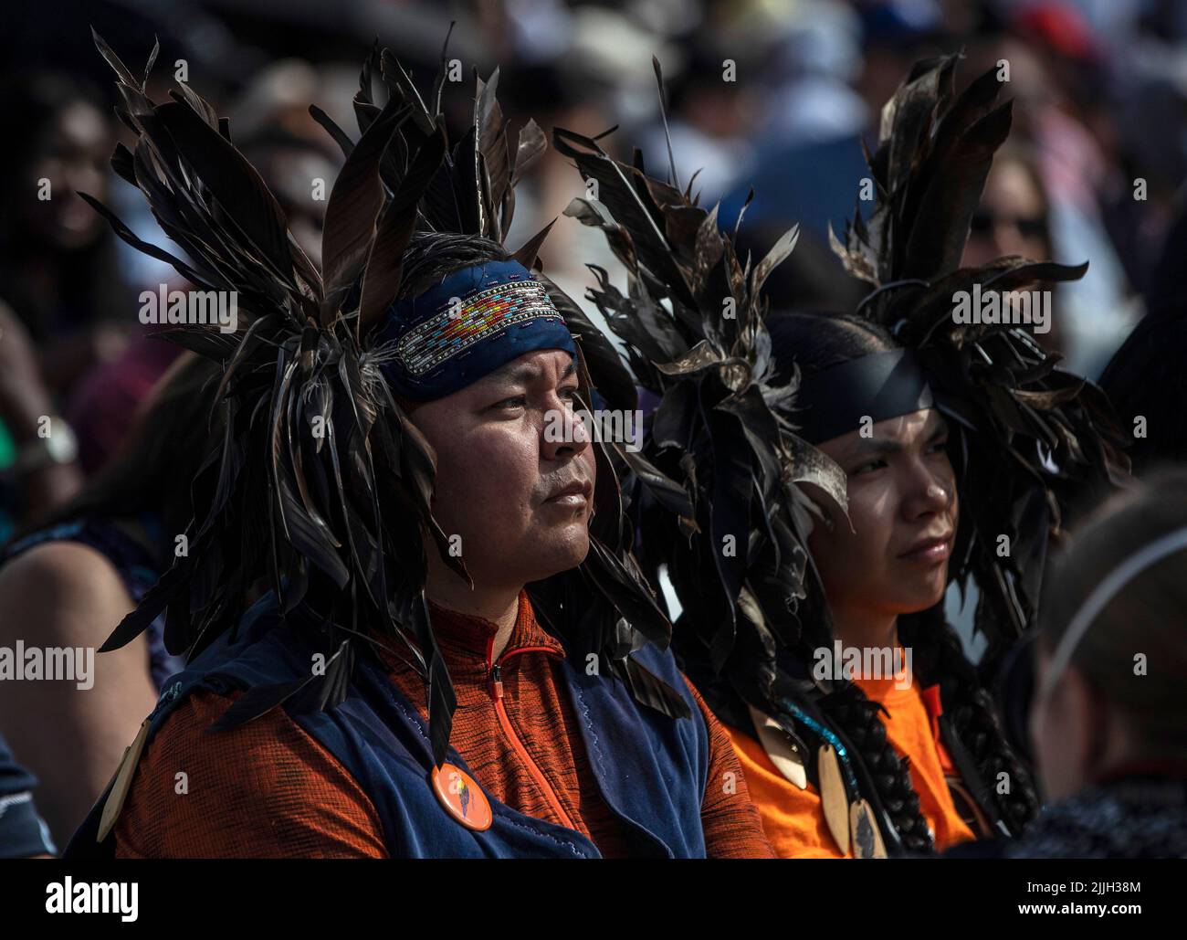 Edmonton, Canada, July 26, 2022. Indigenous members of the crowd watch ...