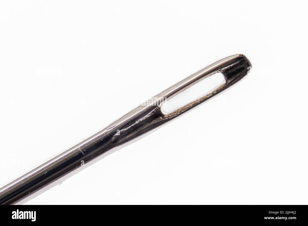 macro photo of a needle on a white background Stock Photo - Alamy
