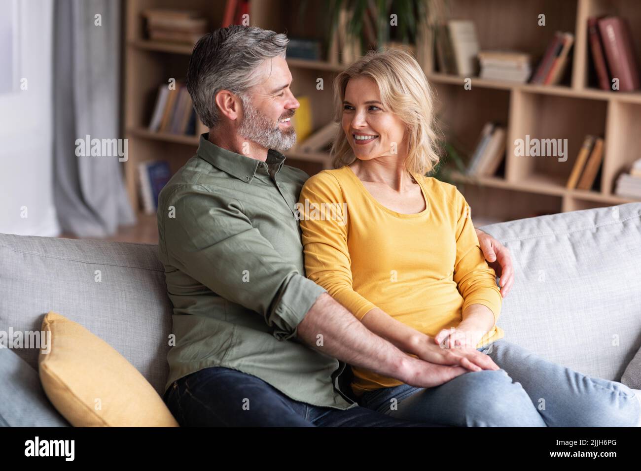 Happy Marriage. Portrait Of Smiling Middle Aged Spouses Embracing At ...