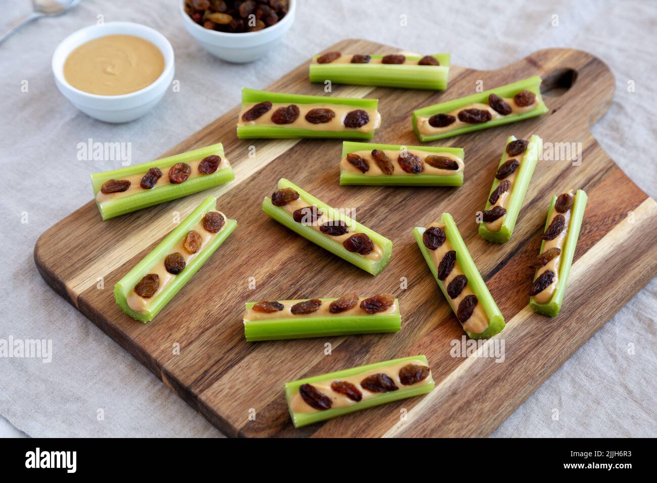 Homemade ants on a log with celery, peanut butter and raisins on a ...