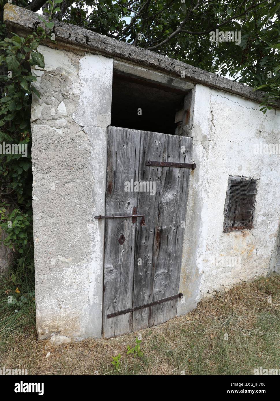wooden door of a pigsty or a small stable of the rural farm Stock Photo ...