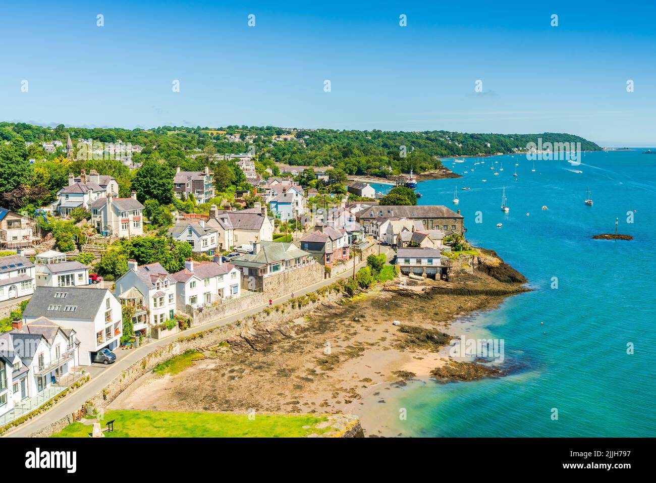 MENAI BRIDGE, ANGLESEY, WALES - JULY 10, 2022: Menai Bridge is a town ...