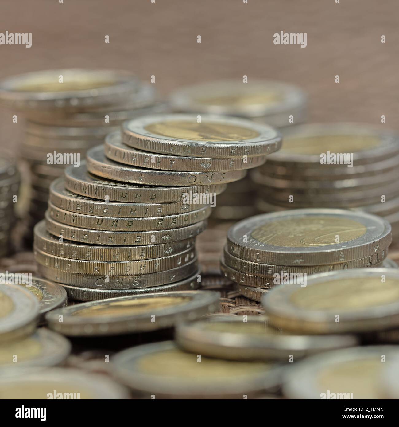 Stacked euro coins in close-up Stock Photo - Alamy
