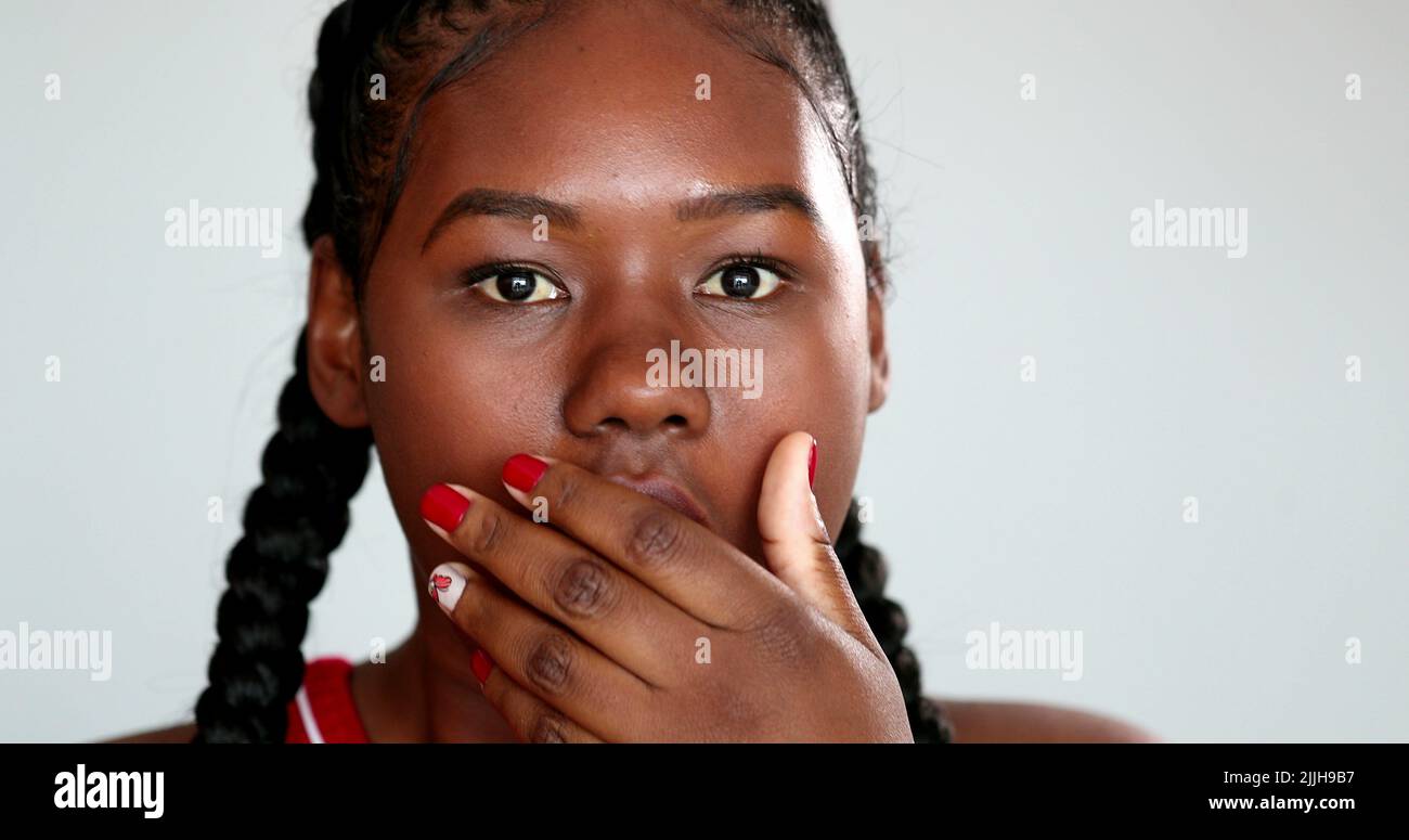 African girl shock reaction to news. Black woman reacting with unbelief ...
