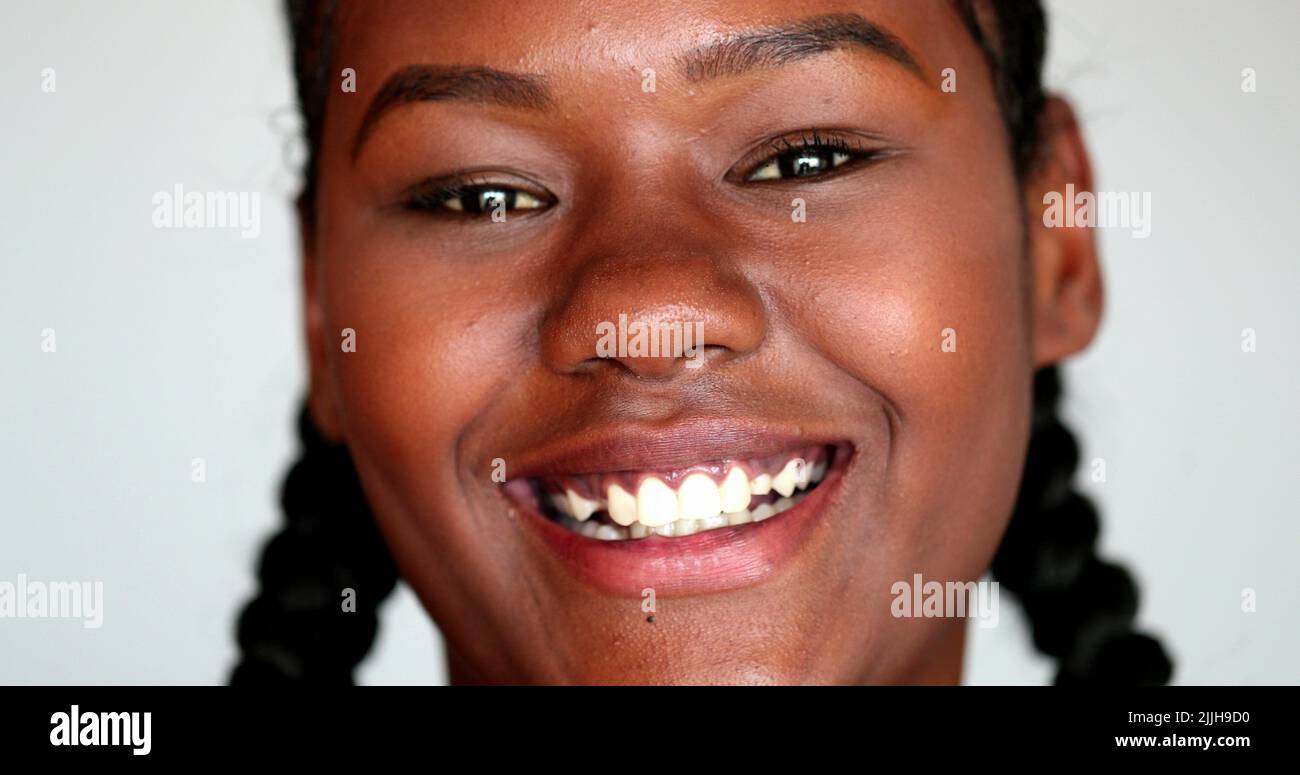 African girl spontaneous smile. Young black woman smiling. Authentic ...