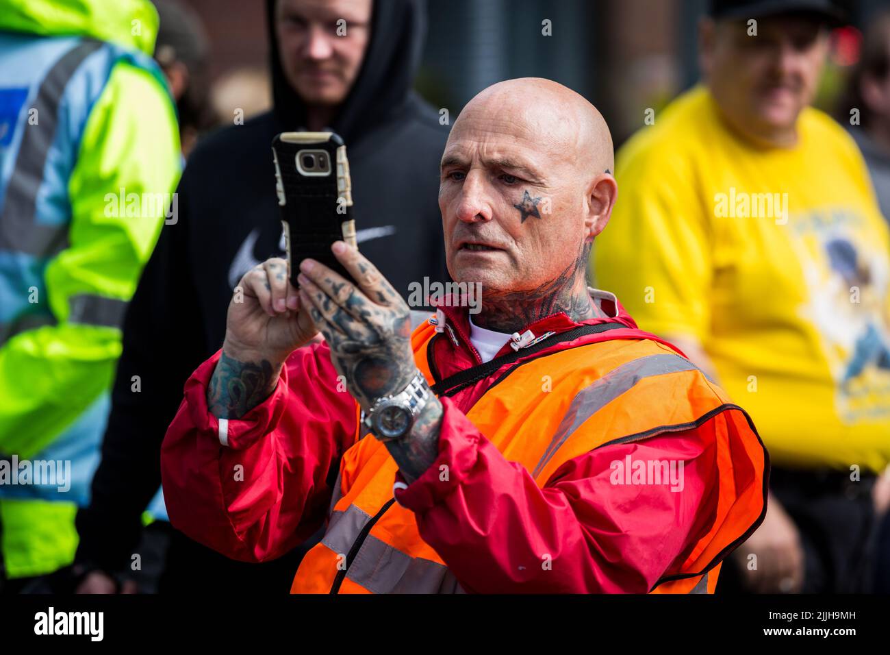 A man taking pictures during the EDL march through Newcastle city Stock ...