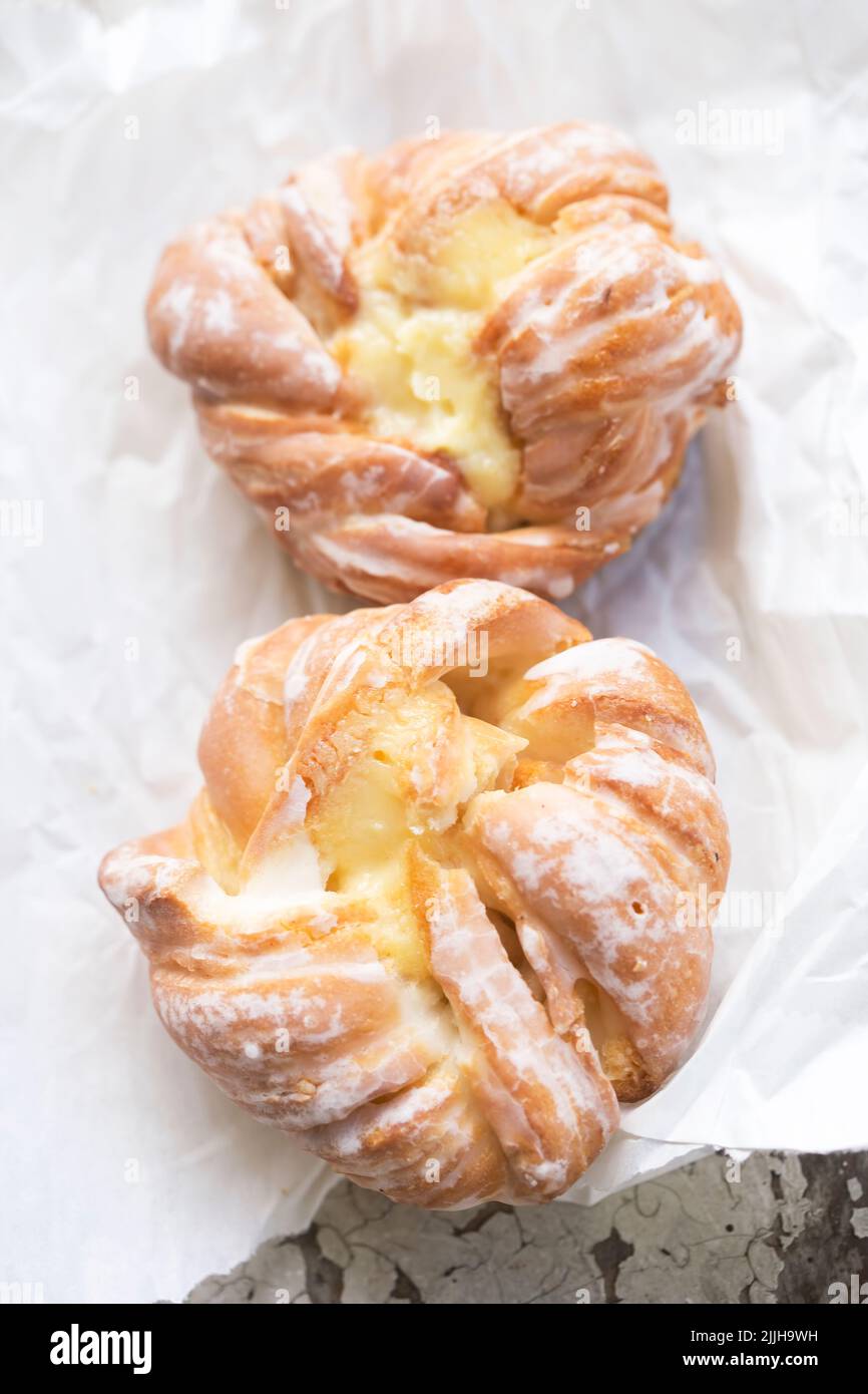 French pastry with vanilla cream and icing Stock Photo - Alamy