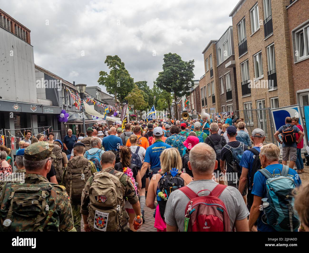 Participants are seen entering the city of the day, Cuijk during the ...