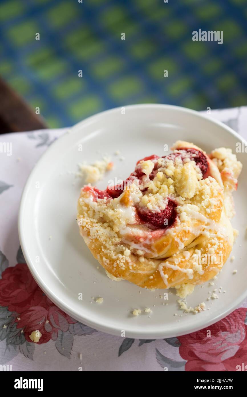 Danish with strawberries and crumble Stock Photo - Alamy