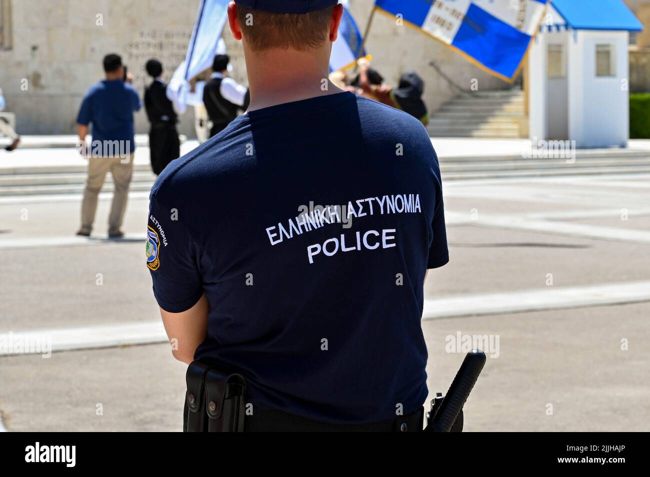 Athens, Greece - June 2022: Rear view of a police officer on duty in ...