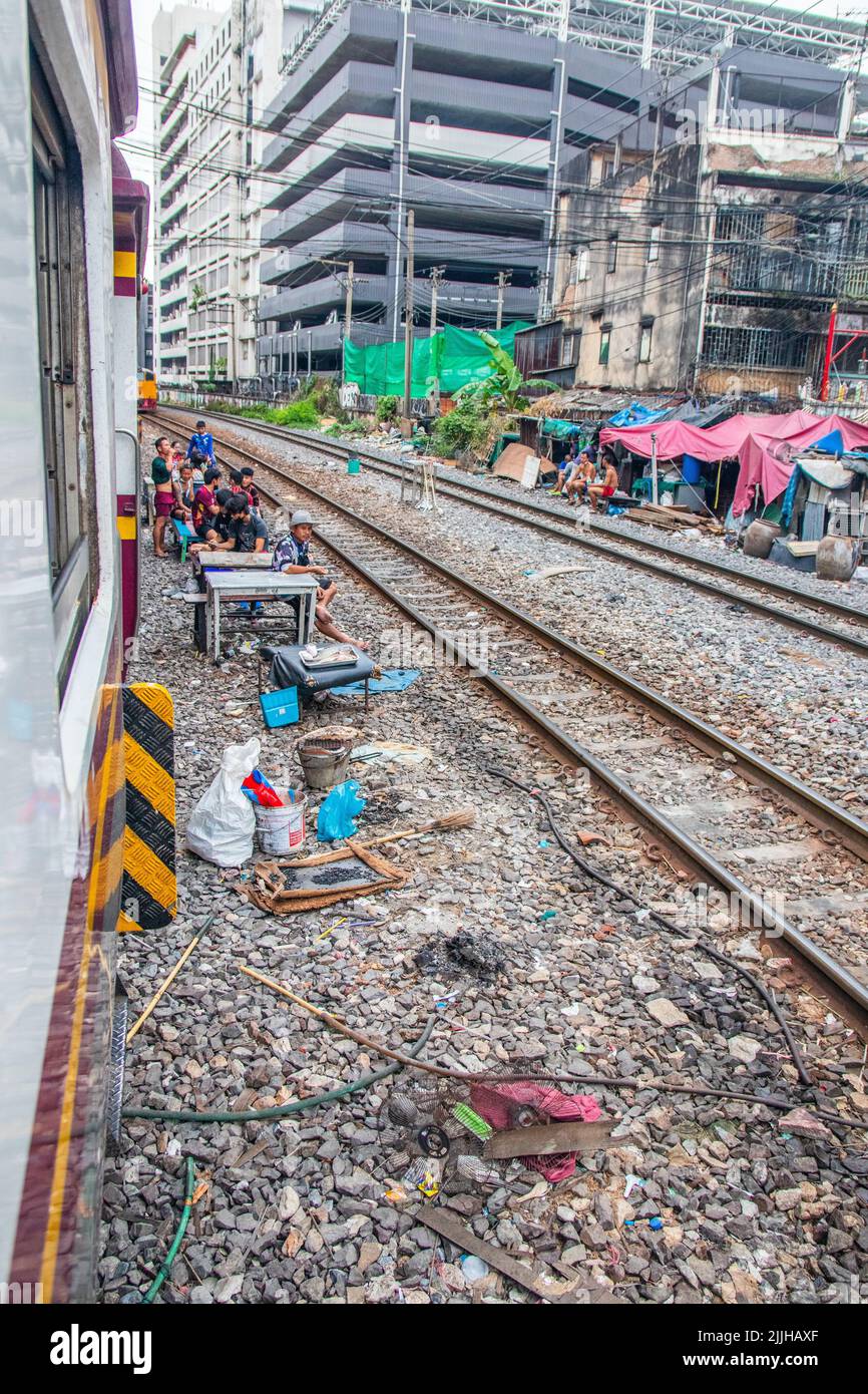 Poor people live between the train tracks directly at the Central ...